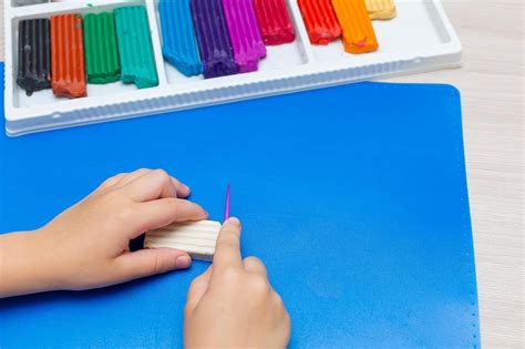 Premium Photo Colorful Plasticine Were Sculpted Into Different Shapes Balls And Rolls Concept