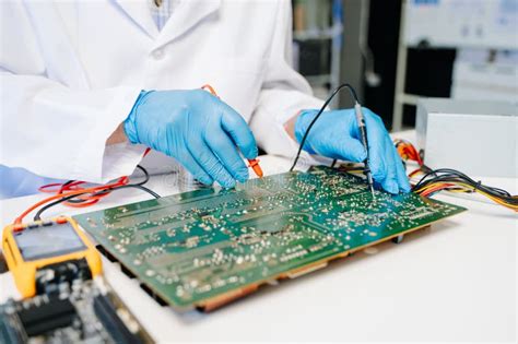 The Technician Repairing The Motherboard In The Lab With Copy Space