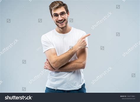 Young Man Pointing Fingers Away At Copy Space Over 8 994 Royalty Free