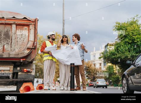 Discussing Blueprint Architects And Engineers Analyzing Project Costs