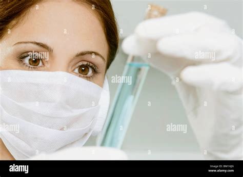Female Lab Technician Analyzing Sample In Test Tube Stock Photo Alamy