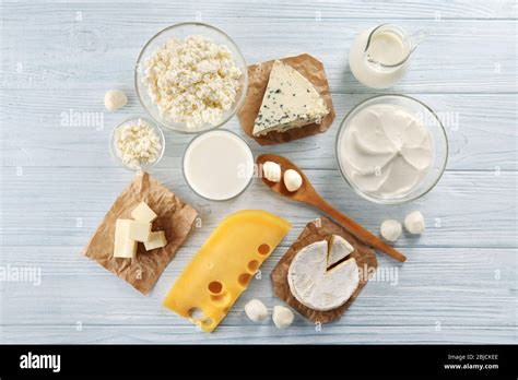 Different Types Of Dairy Products On Wooden Background Stock Photo Alamy
