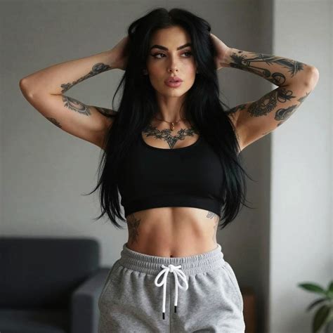 Tattooed Woman In Sportswear Posing Confidently Indoors Swap Face