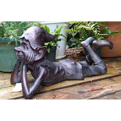 Inspirational Ting Pixie Laying Polystone Resin Garden Ornament Wilko