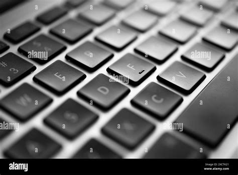Detailed Close Up View Of A Modern Laptop Keyboard With Focus On The