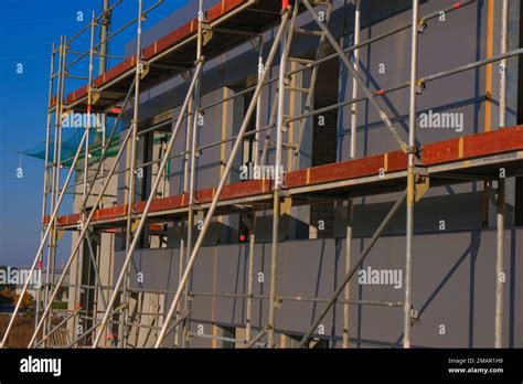 Scaffolding And Constructionnew House In Scaffolding Foundation And Walls Of The House In