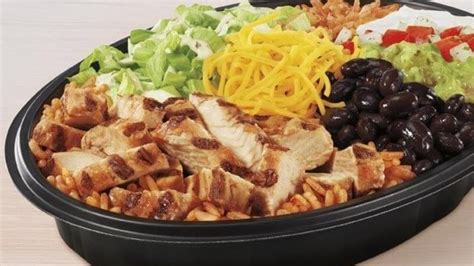 This Taco Bell Power Bowl Is Unrecognizable Under All The Hot Sauce