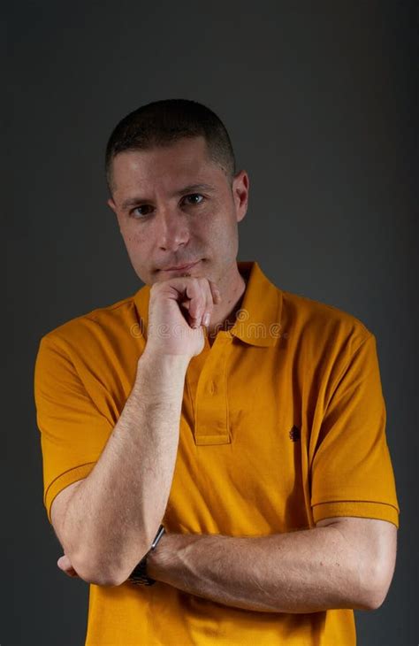 Young Man in Yellow T-shirt Posing in a Studio Stock Image - Image of fashion, casual: 255894941