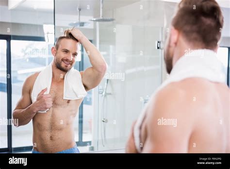 Handsome Man Looking In Mirror Stock Photo Alamy