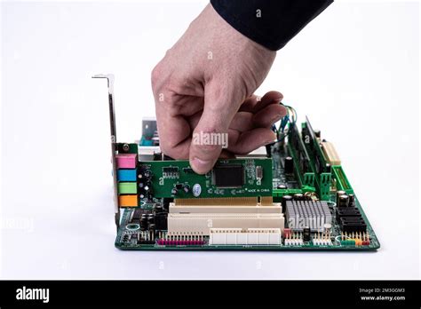 engineer repairman holding hands in black gloves chip processor cpu to
