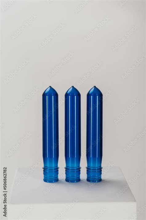 Preforms For PET Bottles And Kegs Before The Blow Molding Filling And Labeling Process Blue