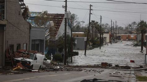 Roofs Ripped Apart Neighborhoods Submerged And Flying Debris