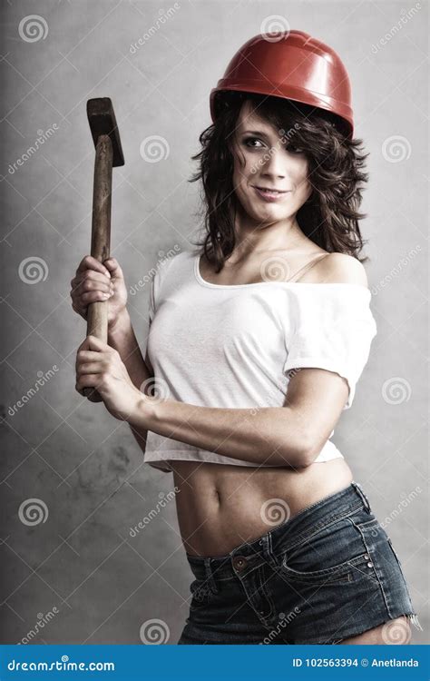 Girl In Safety Helmet Holding Hammer Tool Stock Photo Image Of Worker Helmet 102563394