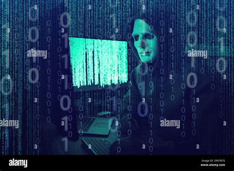 Cyber Attack Anonymous Hacker In Mask Working With Computers On Dark