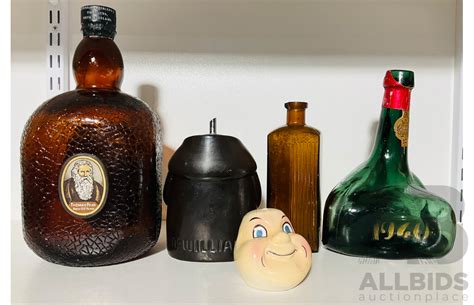 Collection Of Four Vintage Bottles Lot 1530265 Allbids