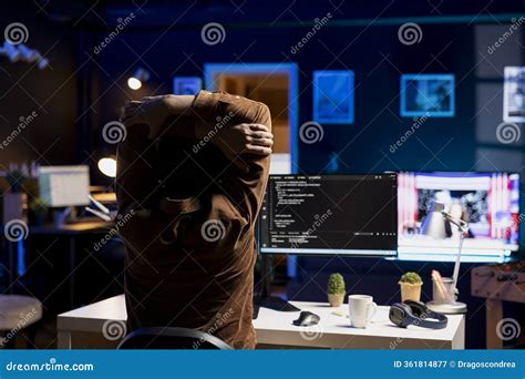 Programmer Doing Software Quality Assurance Stretching Arms Behind
