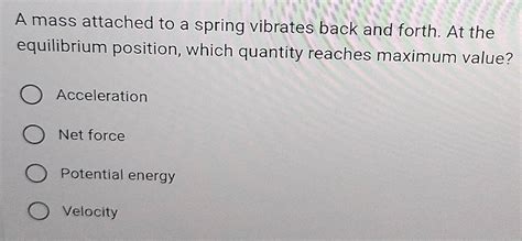 Selesaia Mass Attached To A Spring Vibrates Back And Forth At The