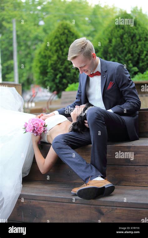 Bride And Groom Sitting Stock Photos Bride And Groom Sitting Stock Images Alamy
