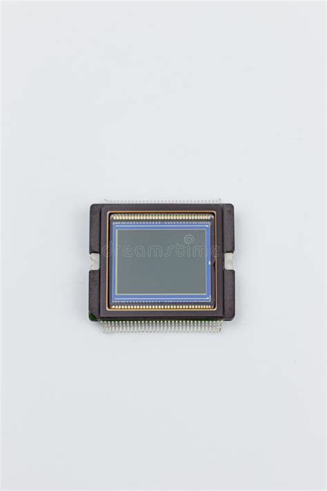 image sensor inside digital camera ccd cmos on white background stock