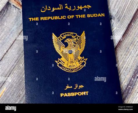 The Republic Of Sudan Passport With A Gilded Falcon In The Center Of