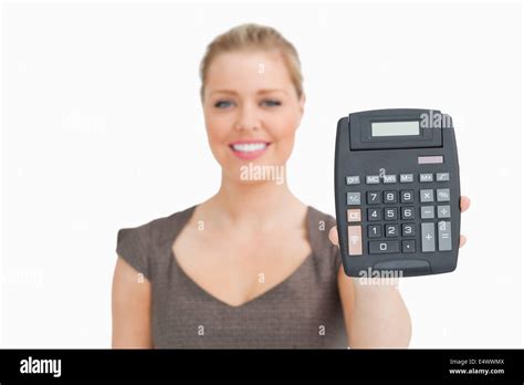 Woman Showing A Calculator In Her Hand Stock Photo Alamy