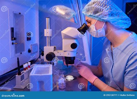 Lab Scientist Focused On Selecting Oocyte Samples For Vitrification