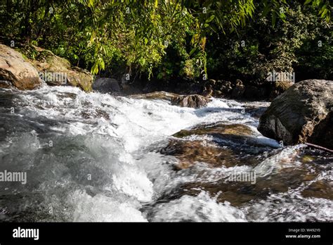 Waterfall Water Flow In Rocks With Green Forests This Image Is Taken