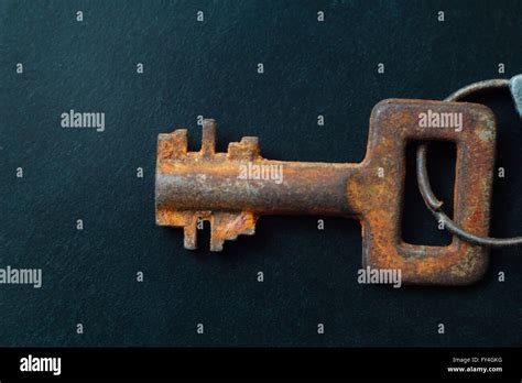 Old Rusty Key On Dark Background Stock Photo Alamy