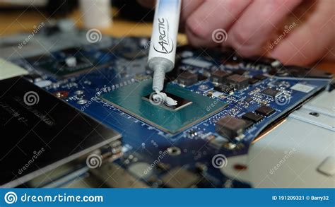 Applying Thermal Paste To CPU Royalty Free Stock Photo CartoonDealer Com