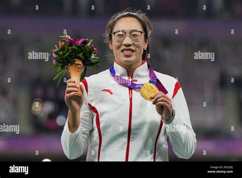 Gold Medalist Chinas Feng Bin Celebrates On The Podium During The Victory Ceremony For The