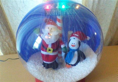 Gemmy 14 Motorized Large Musical Penguin And Santa Snow Globe Happy