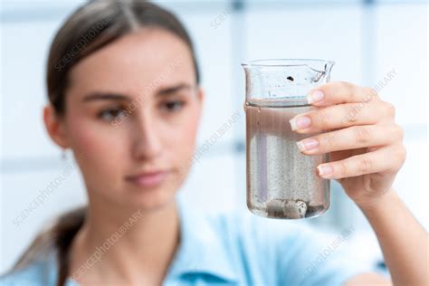 Scientist Analysing Liquid Sample Stock Image F041 9446 Science Photo Library