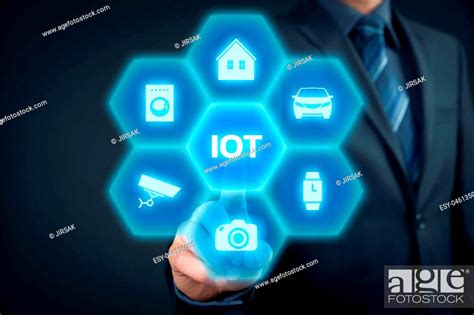 Internet Of Things IoT Concept Businessman Click On IoT Button