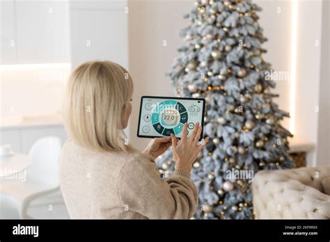 Modern Home Smart Automation App On Tablet Display In Woman Hands At