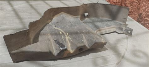 Please help me to identify this part that fell off. : r/MechanicAdvice