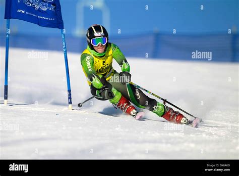 An Alpine Skier At A Gate While Racing On The Giant Slalom Course Stock