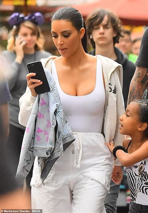 Kim Kardashian Goes Braless While Visiting Disneyland With North West