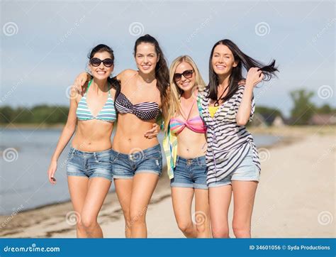 Girls In Bikinis With Ice Cream On The Beach Royalty Free Stock