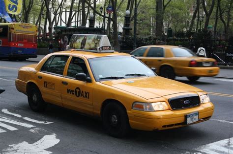 Yellow Taxi Cab At Intersection