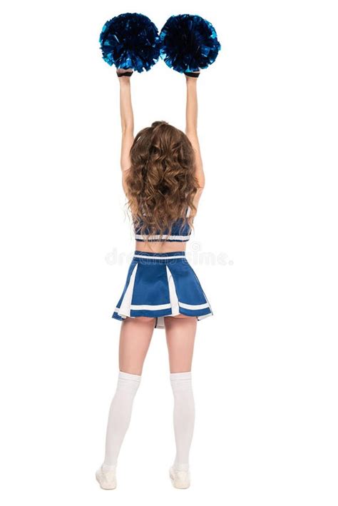 Happy Cheerleader Girl In Blue Uniform With Pompoms On Green Field