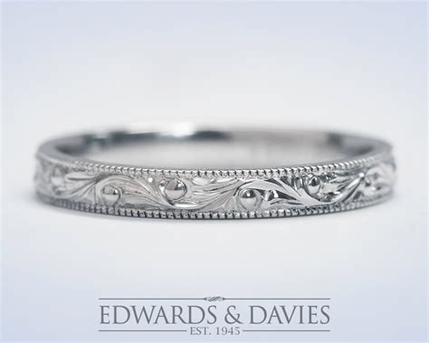 Elegant Engraved Wedding Ring In White Gold Timeless Symbol Of Commitment
