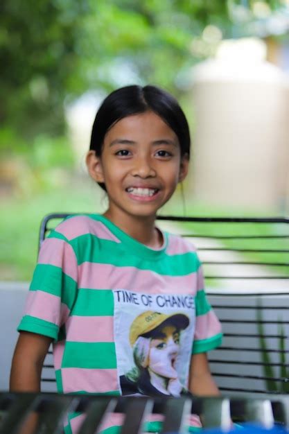 Premium Photo Portrait Of Smiling Girl Premium Photo Portrait Of Smiling Girl