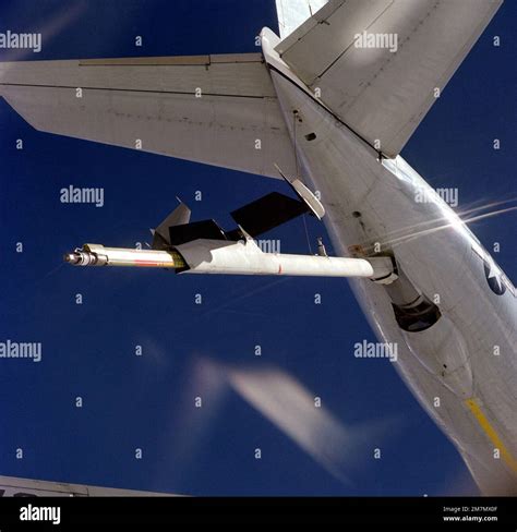 An Air To Air Underside View Of The Advanced Aerial Refueling Boom