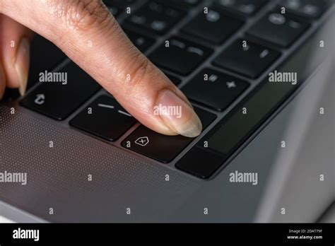 Close Up Female Hand Pressing A Backspace Key For Delete On A Laptop
