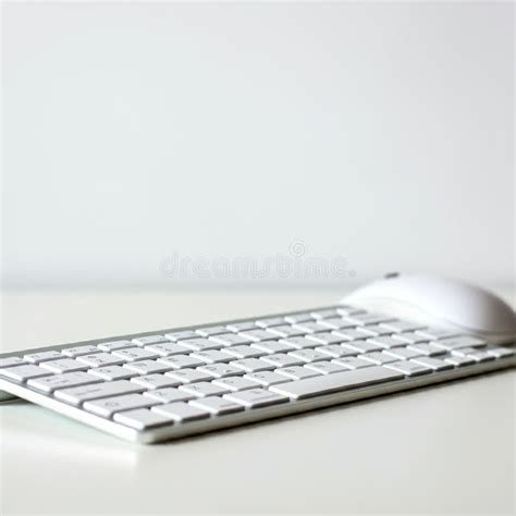 A White Computer Keyboard And Mouse Are Placed On A Clean White Surface The Stock Illustration