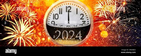 New 2024 Year Greeting Card With Clock And Fireworks Banner Design