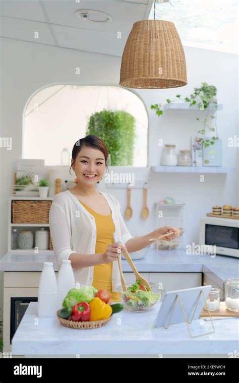 Woman Cooking According The Tutorial Of Online Virtual Master Class