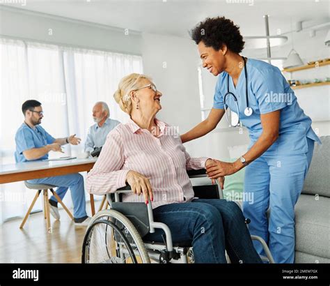 Nurse Doctor Senior Care Caregiver Help Assistence Wheelchair