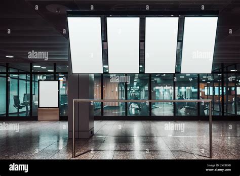 Four Vertically Oriented Blank Mock Ups Of Tv Screens Of A Departure And Arrivial Board And A