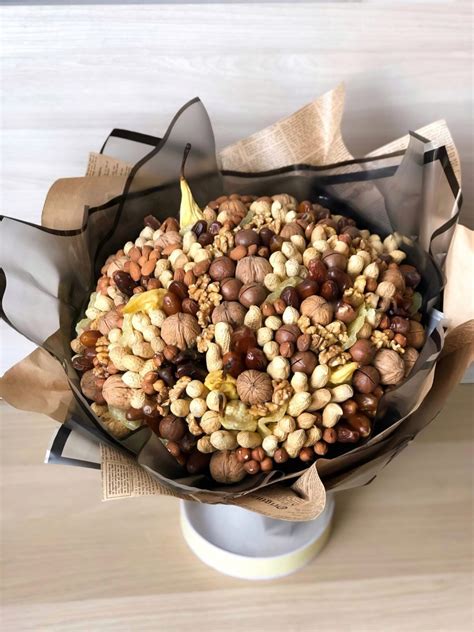 Купить мужской букет из орехов и сухофруктов по доступной цене с доставкой в Москве и области в